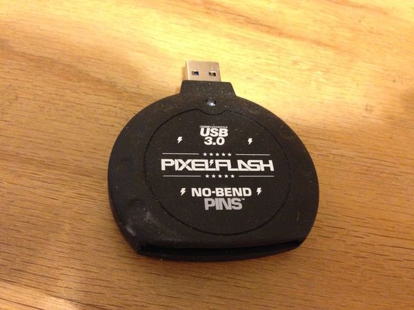 Download photos from CF card to iPad: I have an adapter that will allow ...