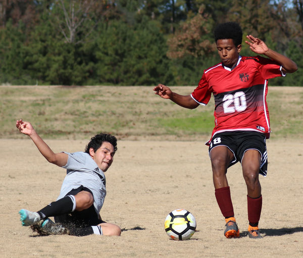 "Futbol" Slide Tackles: A photo series showing the successful execution ...
