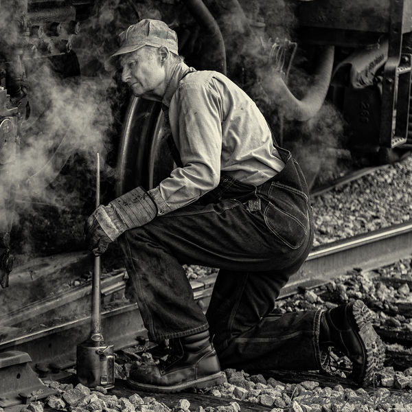The Oiler: One of the steam crew at our railway museum checking moving ...