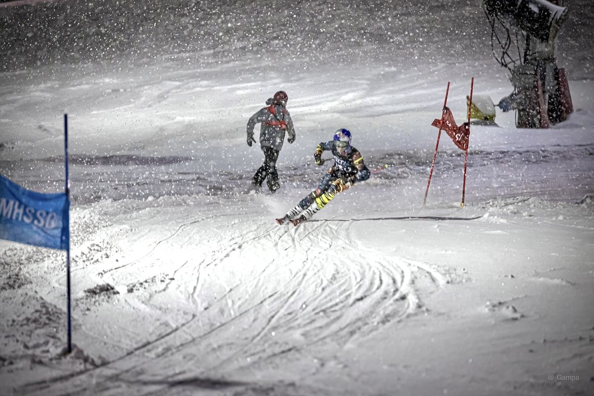 Giant Slalom ski racing … under the lights … during a snowstorm … at 5 ...