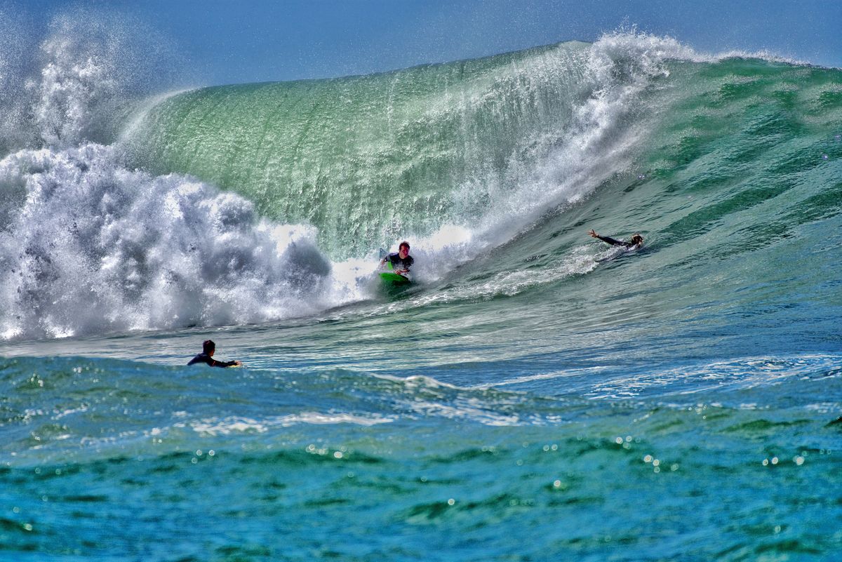 Water Falls: This surfer off Waikiki was surfing a waterfall with a ...