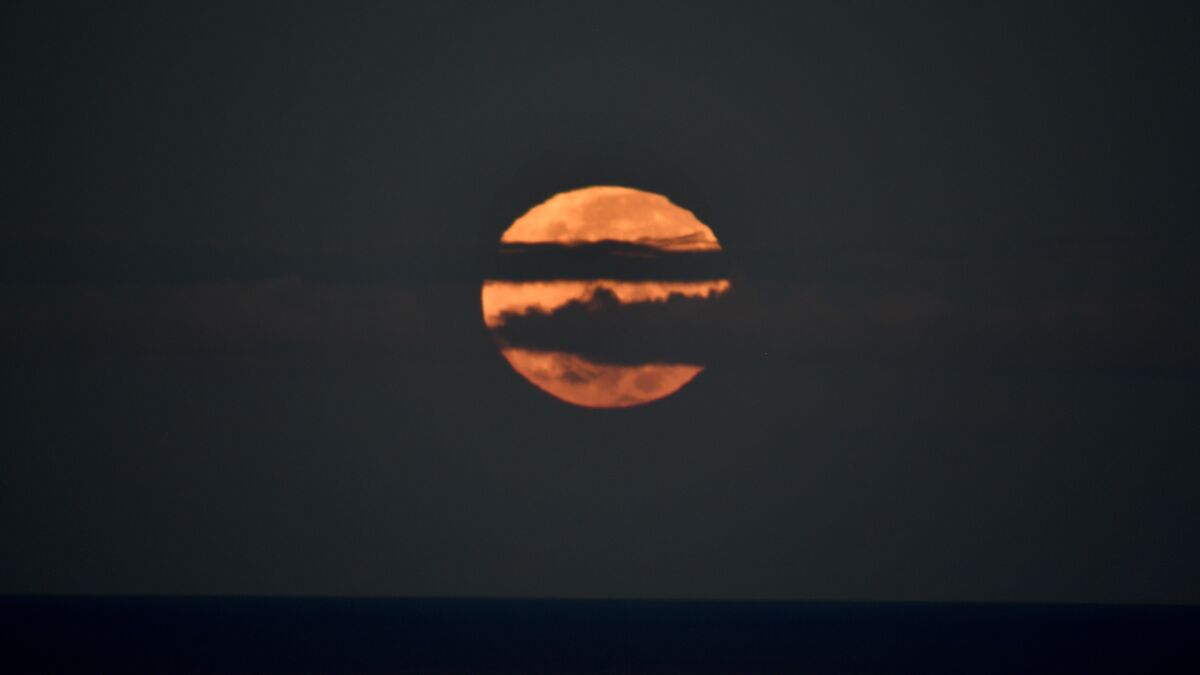 Full Moonset: Caught this perfect full moonset from our daughter’s deck on the Big Island of ...