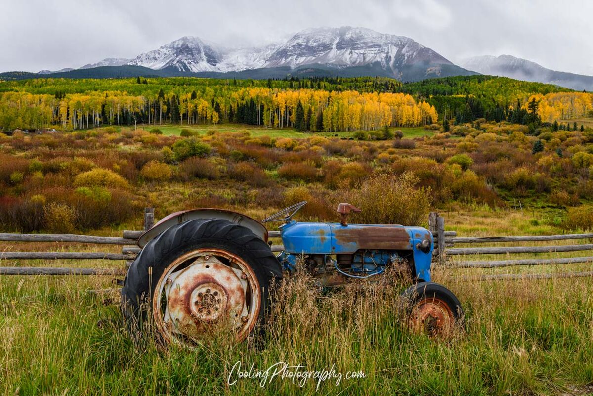 blue tractor: cool old tractor......cooler backdrop....now that's Colorado!