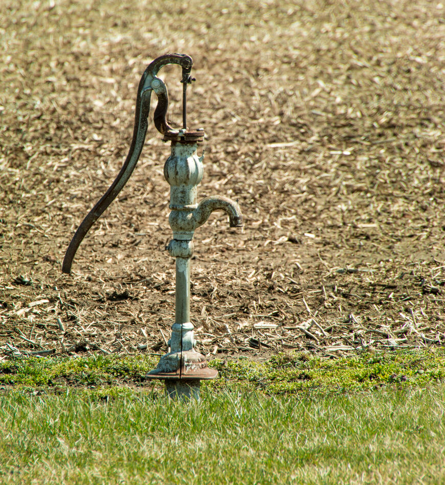 A Drink, Anyone? This old pitcher pump sits out in a field by itself ...