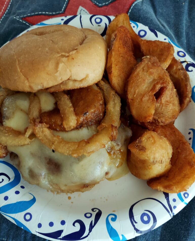 Burger: Poutine burger and sidewinder fries. I am normally not a bit ...