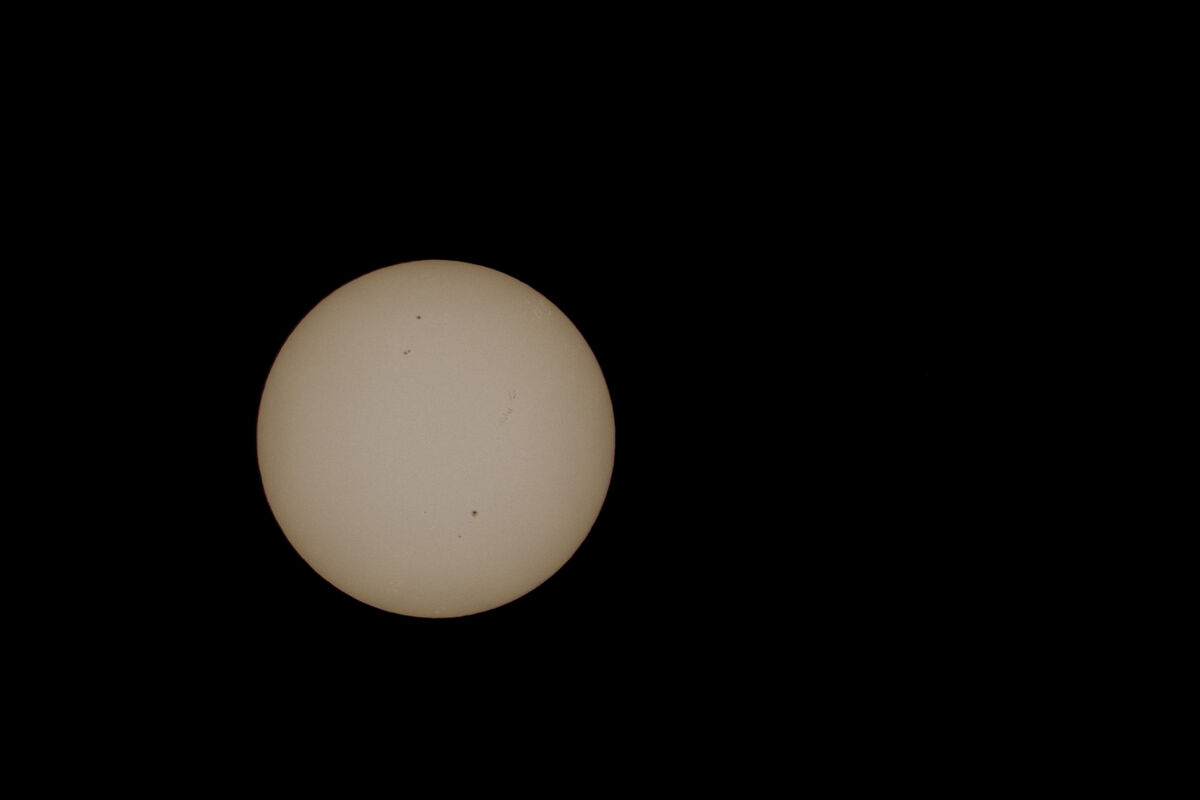 Sunspots: I took this picture last night with a 300 mm lens and a piece ...