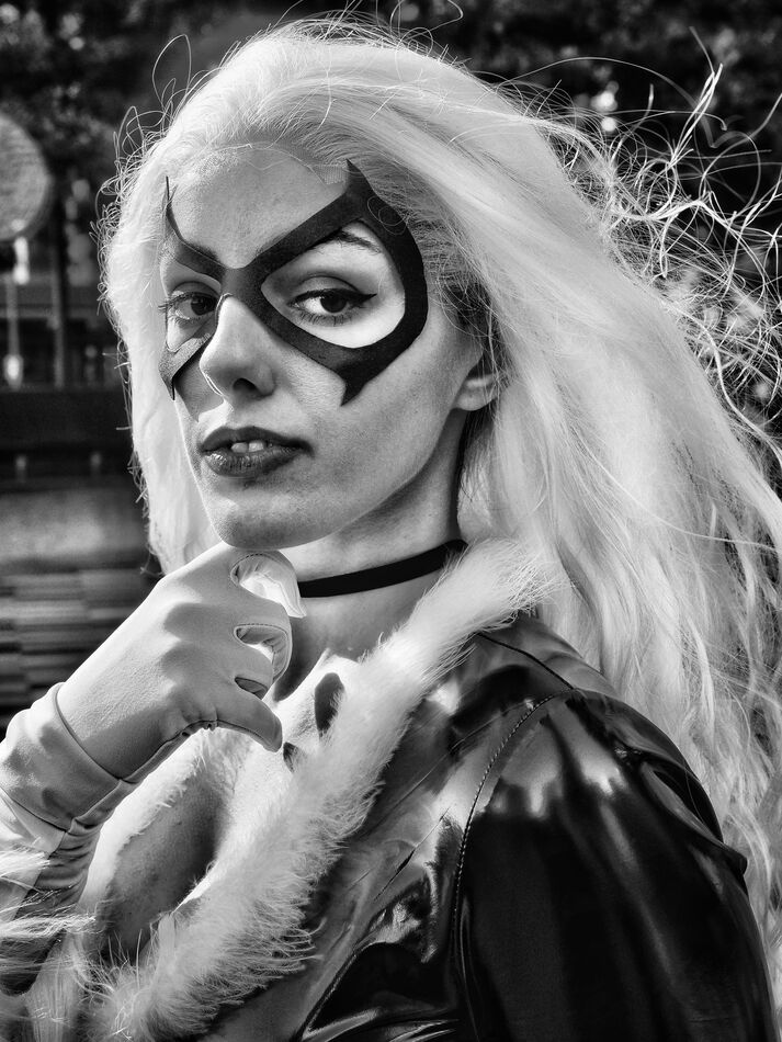 Cosplayer: Comic Book cosplayer poses for her picture...