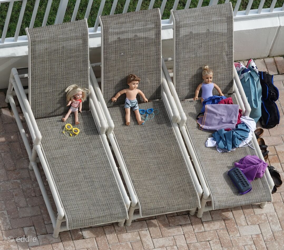 Warning: Three babes sunbathing, one topless!