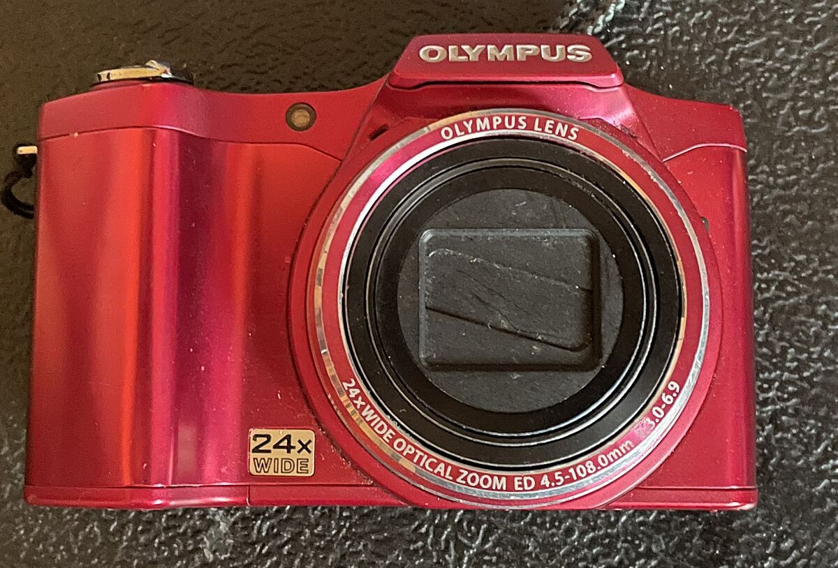 Olympus SZ-14 Camera: This Olympus is in very good condition and includes Charging cable, CD-Rom ...