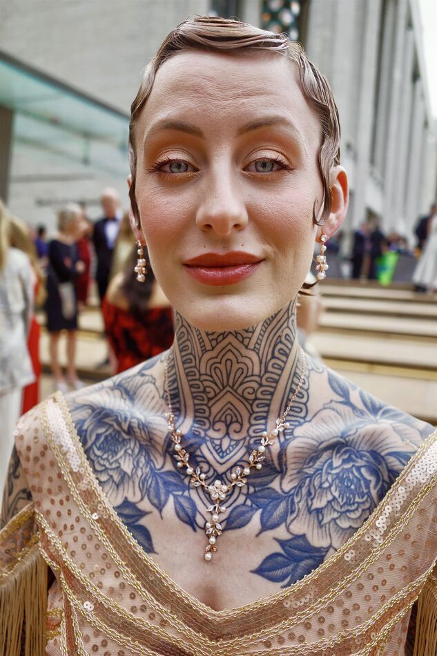 Tattooed Woman: Woman with tattoos poses for a picture...