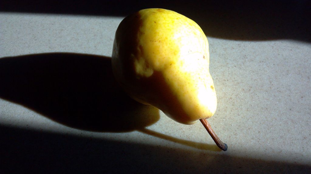 Just a pear: Just a pear and an interesting shadow.