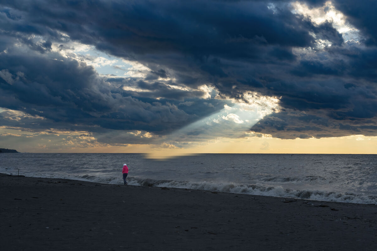 Walking on the Beach ahead of the storm: My wife walking on the Erie ...