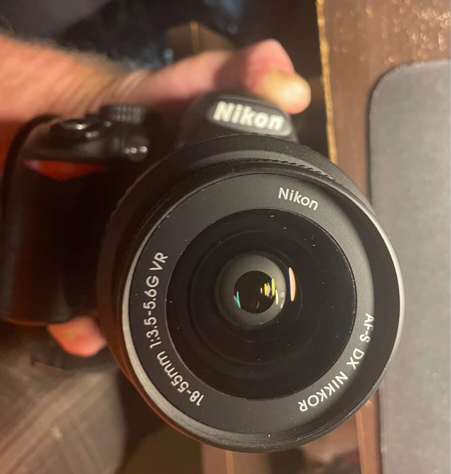 nikon d3100: lower end camera less than 100 shutter count. 18-55mm lens ...