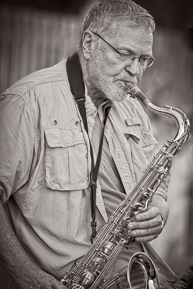 Another Black and White: A sax player...
