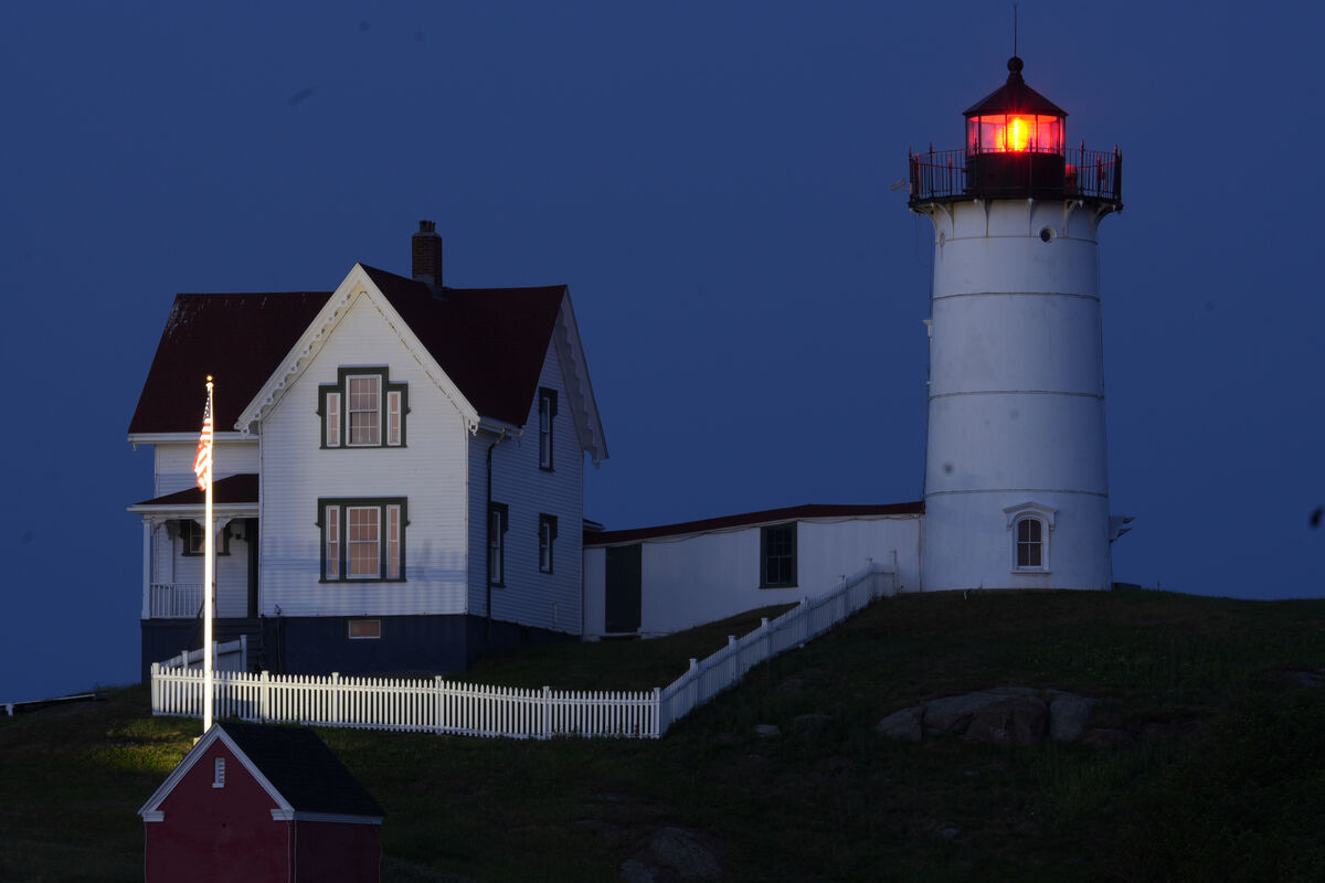 Two lighthouses seen from same spot: The Nubble Lighthouse is ...