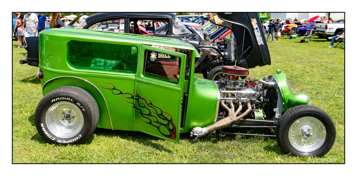 A couple of pretty street rods: At the Monticello IL car show...